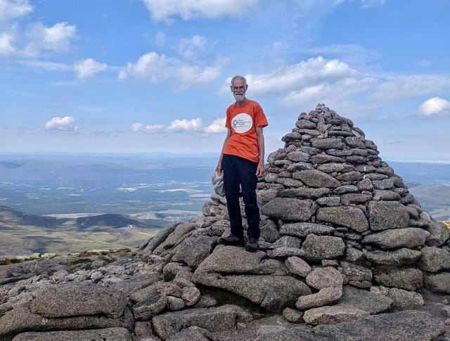 282 AT 82: Nick Gardner at the summit of Cairn Gorm after completing ...